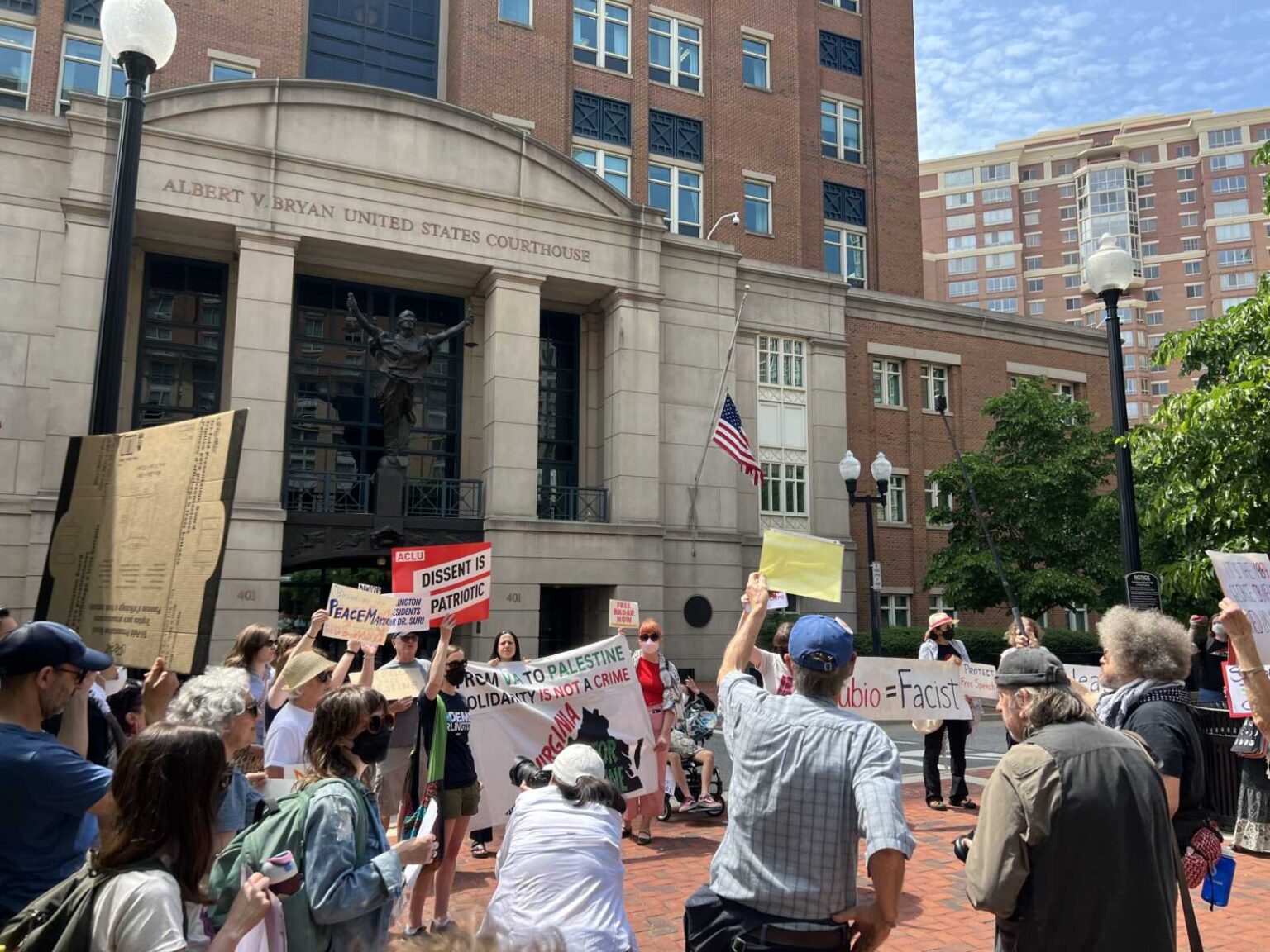 Supporters rally in Alexandria for Georgetown professor detained by ICE ...